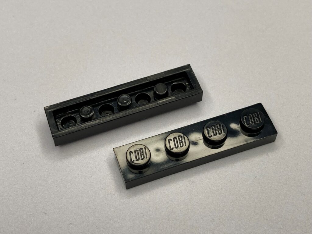 COBI: Plate 1 x 4 (with Solid Pins) – black (czarny) – Leggodt.nl